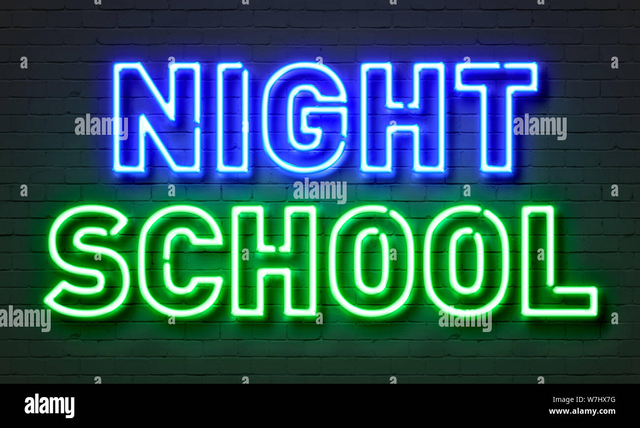 Night school neon sign on brick wall background Stock Photo - Alamy