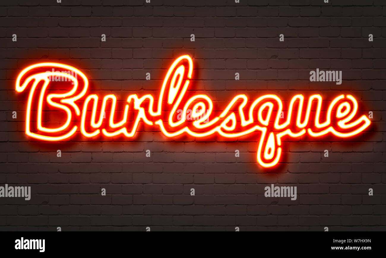Burlesque neon sign on brick wall background Stock Photo - Alamy