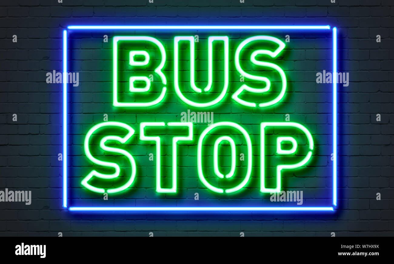 Bus stop neon sign on brick wall background Stock Photo - Alamy
