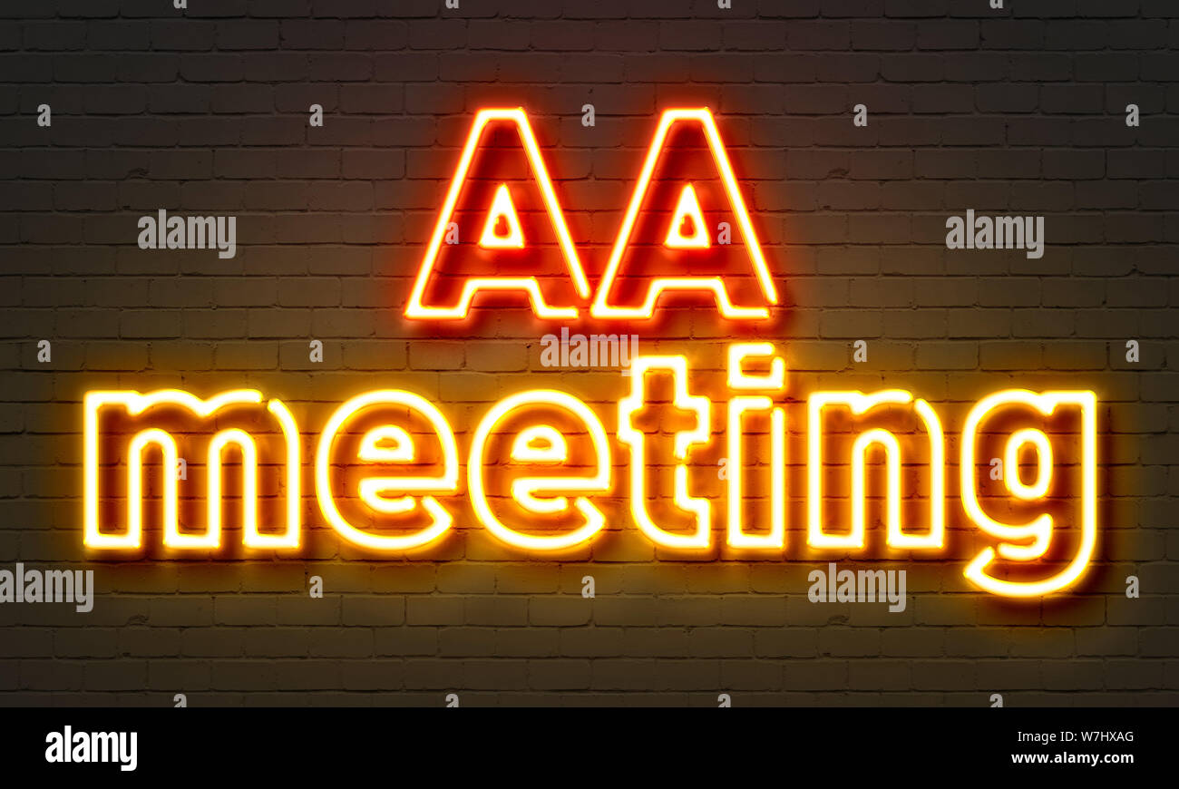 AA meeting neon sign on brick wall background Stock Photo - Alamy