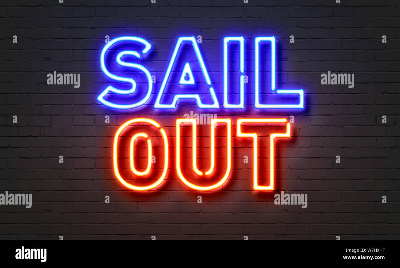 Sail out neon sign on brick wall background Stock Photo - Alamy