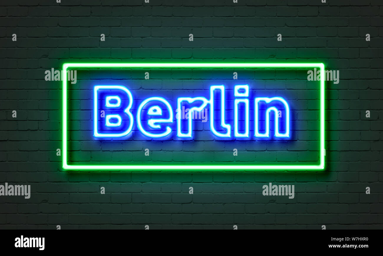 Berlin neon sign on brick wall background Stock Photo - Alamy