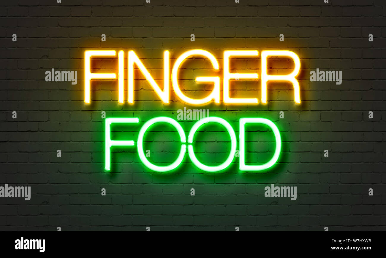Finger food neon sign on brick wall background Stock Photo - Alamy