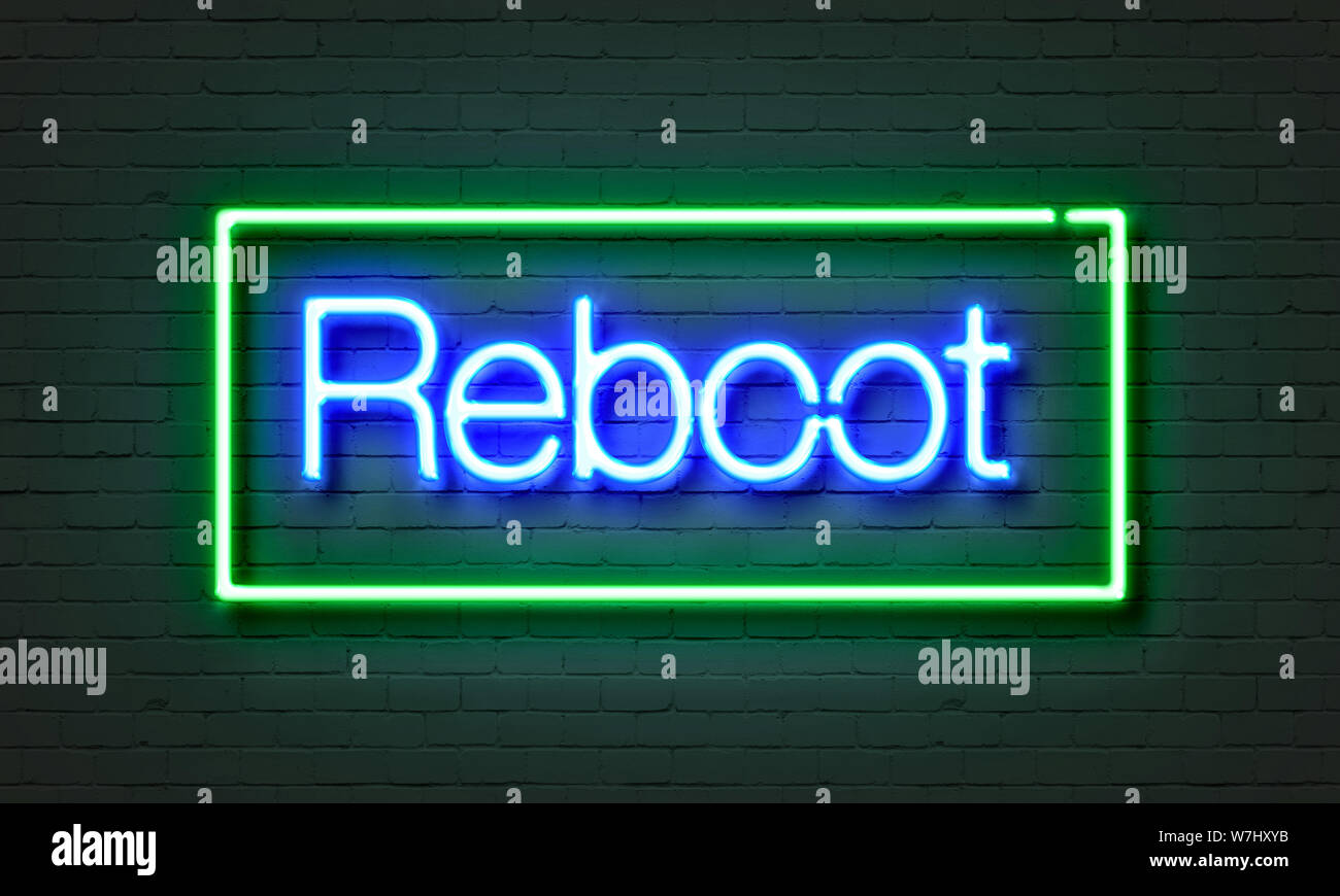 Reboot neon sign on brick wall background Stock Photo - Alamy