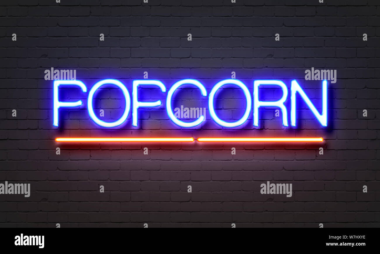 Popcorn neon sign on brick wall background Stock Photo - Alamy