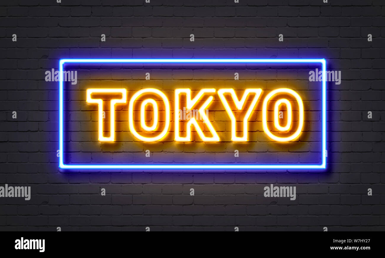 Tokyo neon sign on brick wall background Stock Photo - Alamy