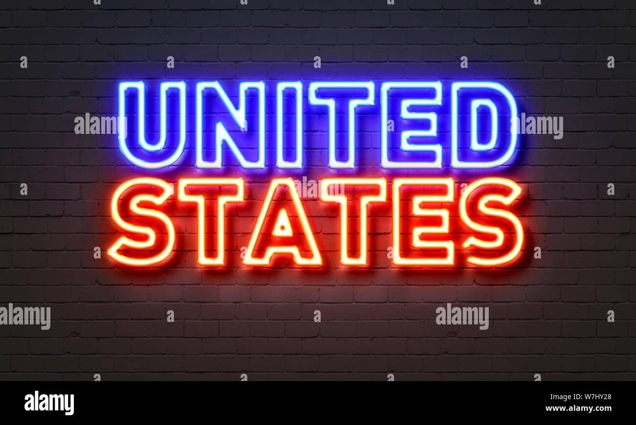 United states neon sign on brick wall background Stock Photo - Alamy