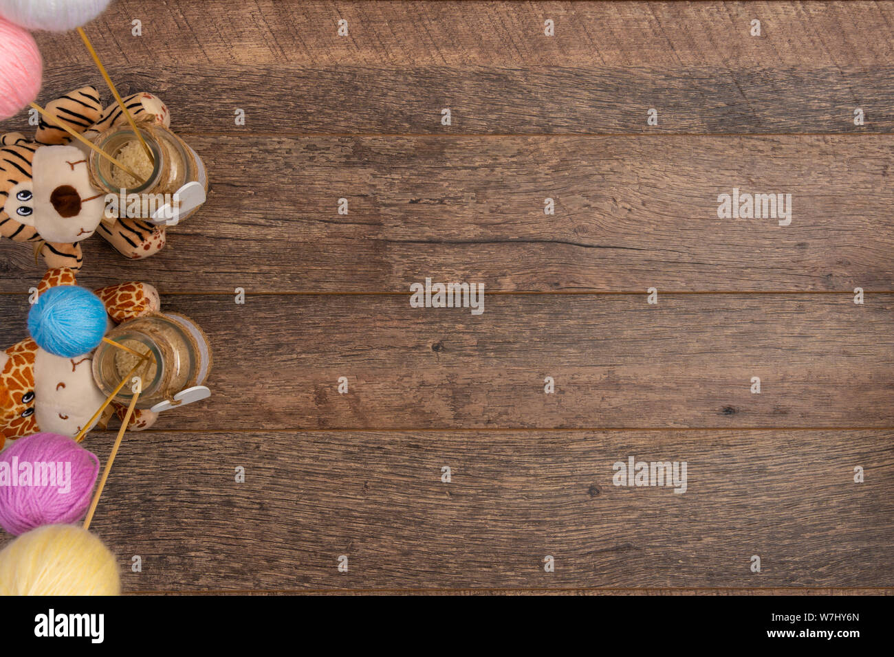 Stuffed plushie and yarn balls, top view Stock Photo - Alamy
