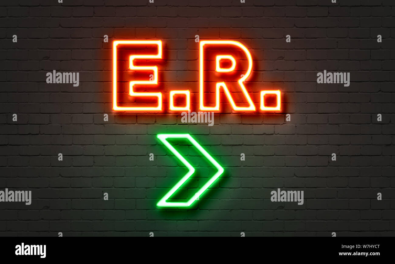 E.R. neon sign on brick wall background Stock Photo - Alamy