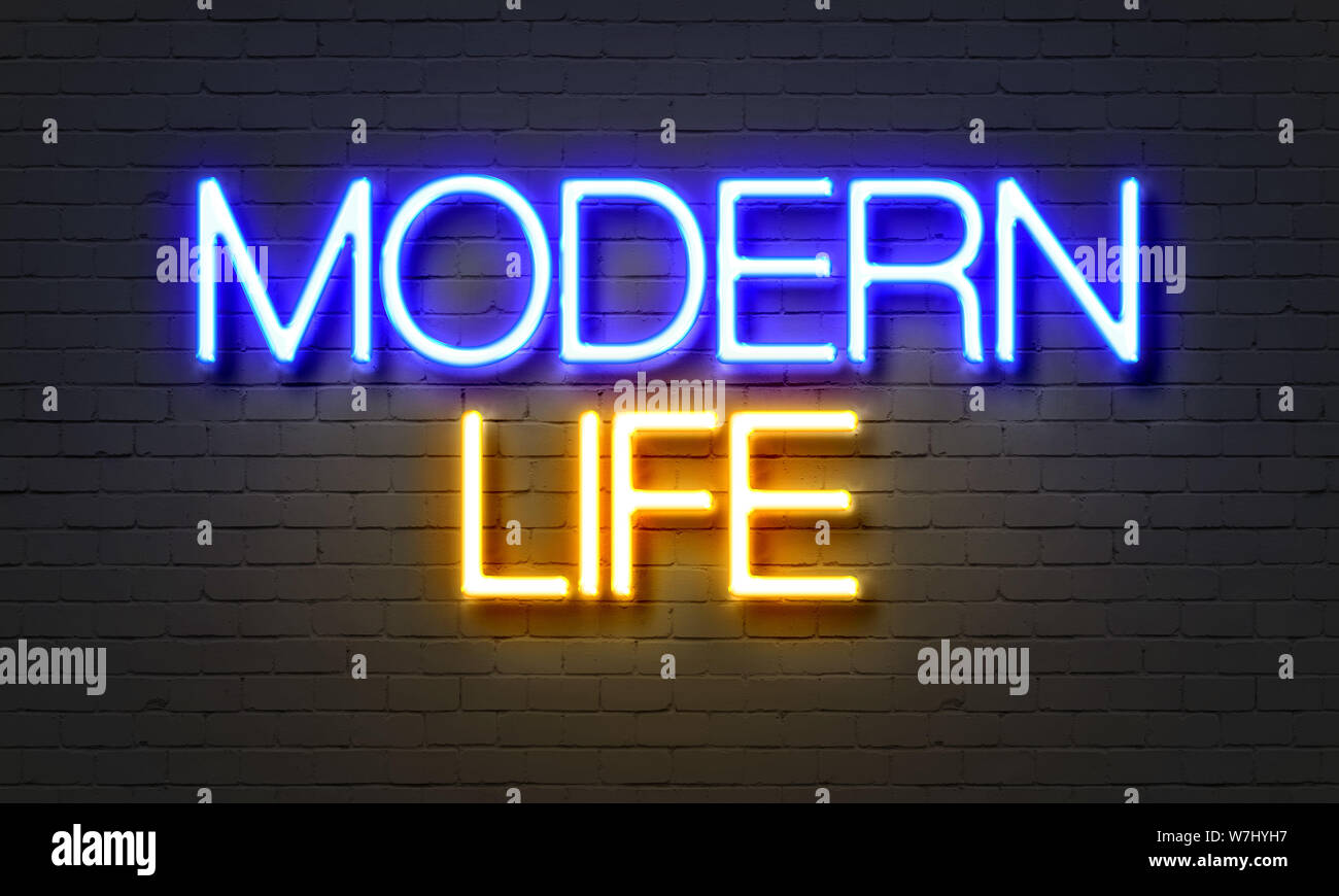 Modern life neon sign on brick wall background Stock Photo - Alamy