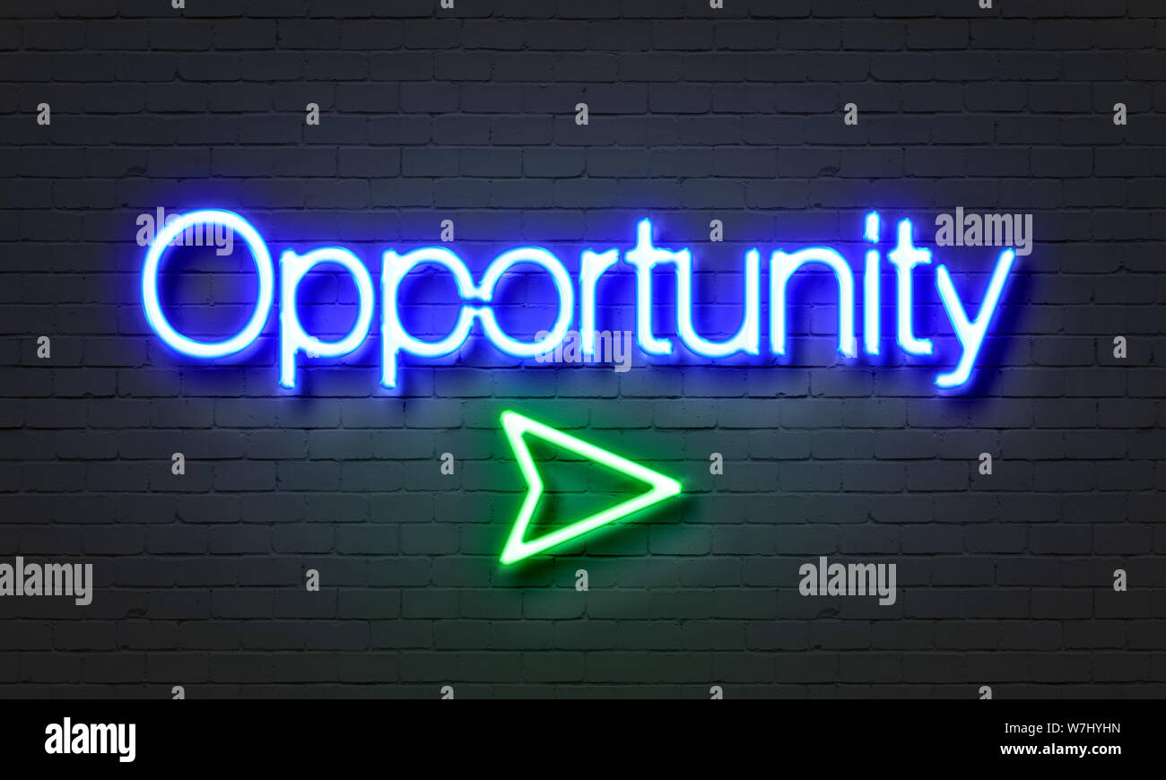 Opportunity neon sign on brick wall background Stock Photo - Alamy