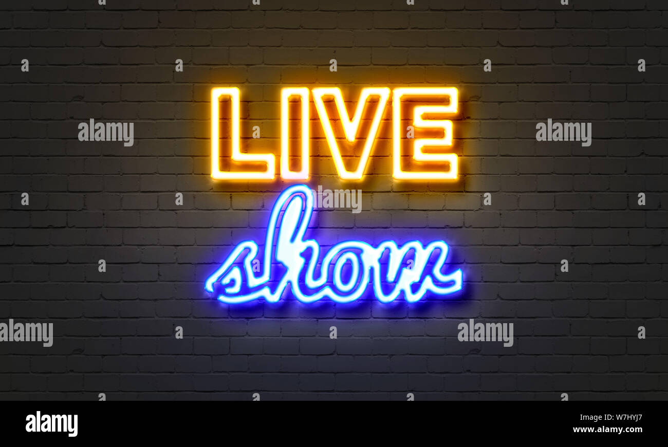 Live show neon sign on brick wall background Stock Photo - Alamy