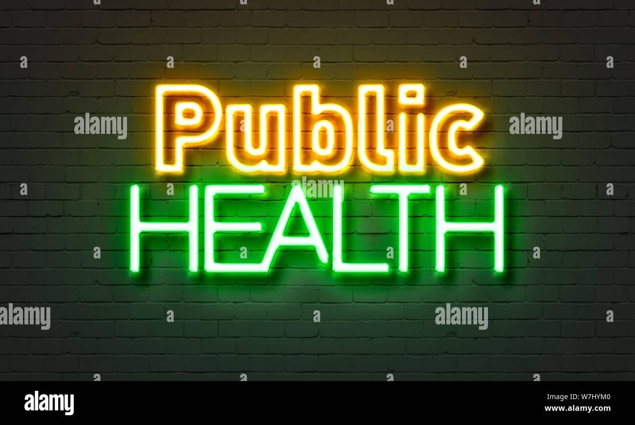 Public health neon sign on brick wall background Stock Photo - Alamy