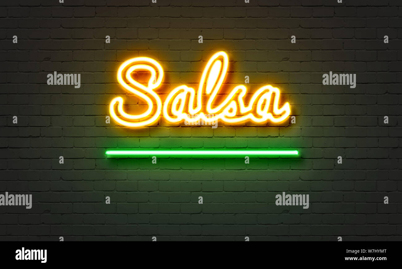 Salsa neon sign on brick wall background Stock Photo - Alamy