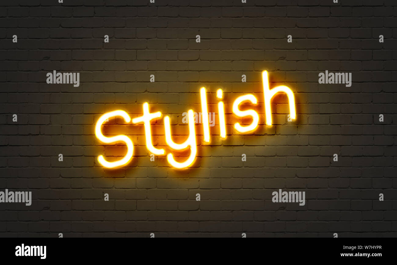 Stylish neon sign on brick wall background Stock Photo - Alamy