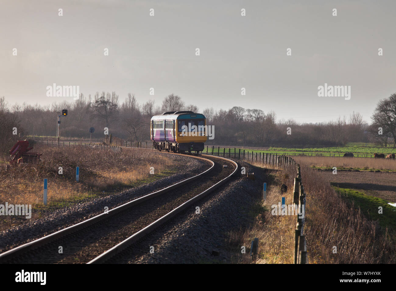 Arriva Northern rail class 142 pacer train 142027 passing Farrington Moss on the single track ...