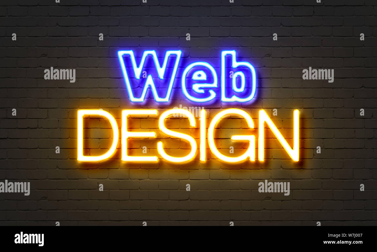 Web design neon sign on brick wall background Stock Photo - Alamy