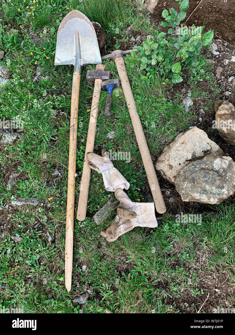 working tools laying on the ground Stock Photo - Alamy