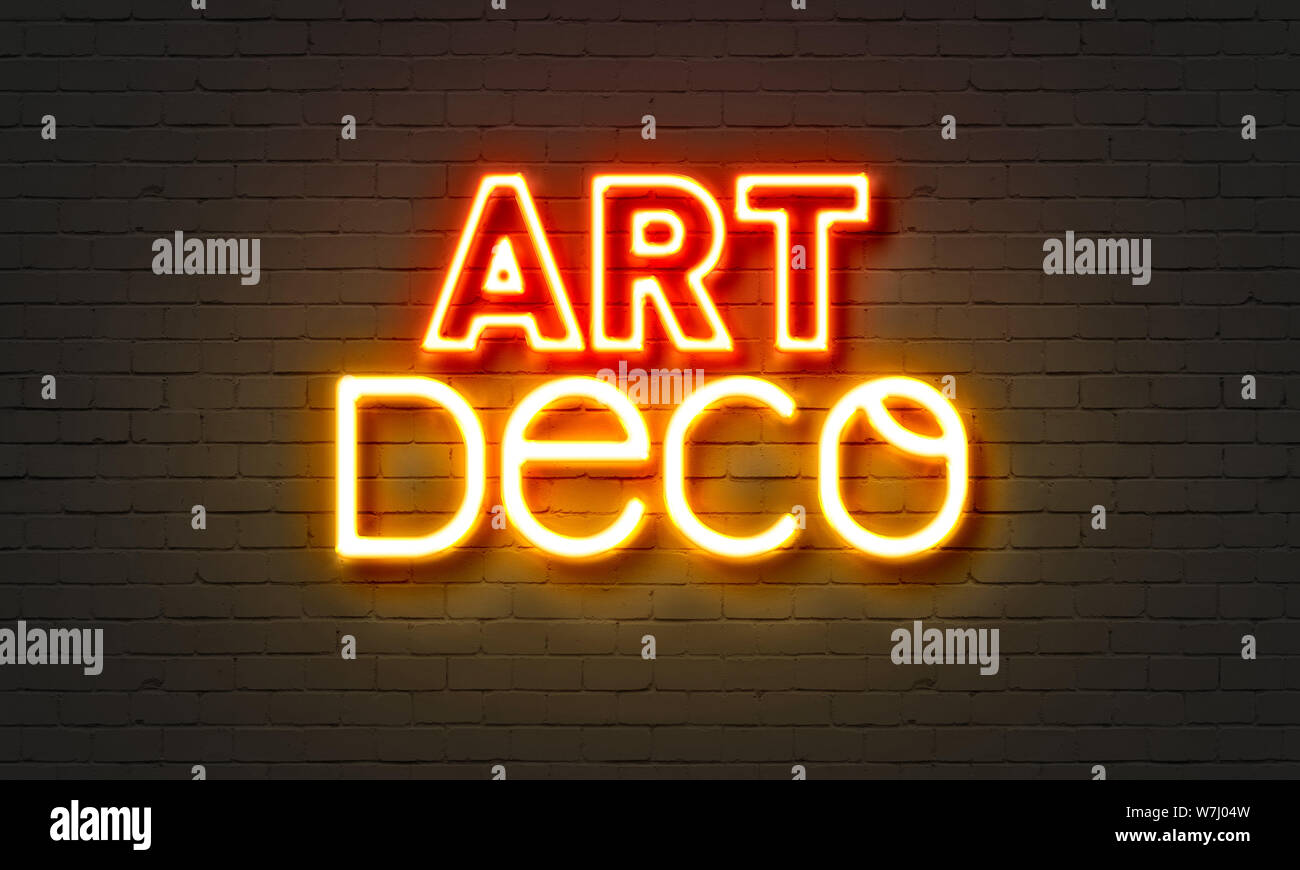 Art deco neon sign on brick wall background Stock Photo - Alamy