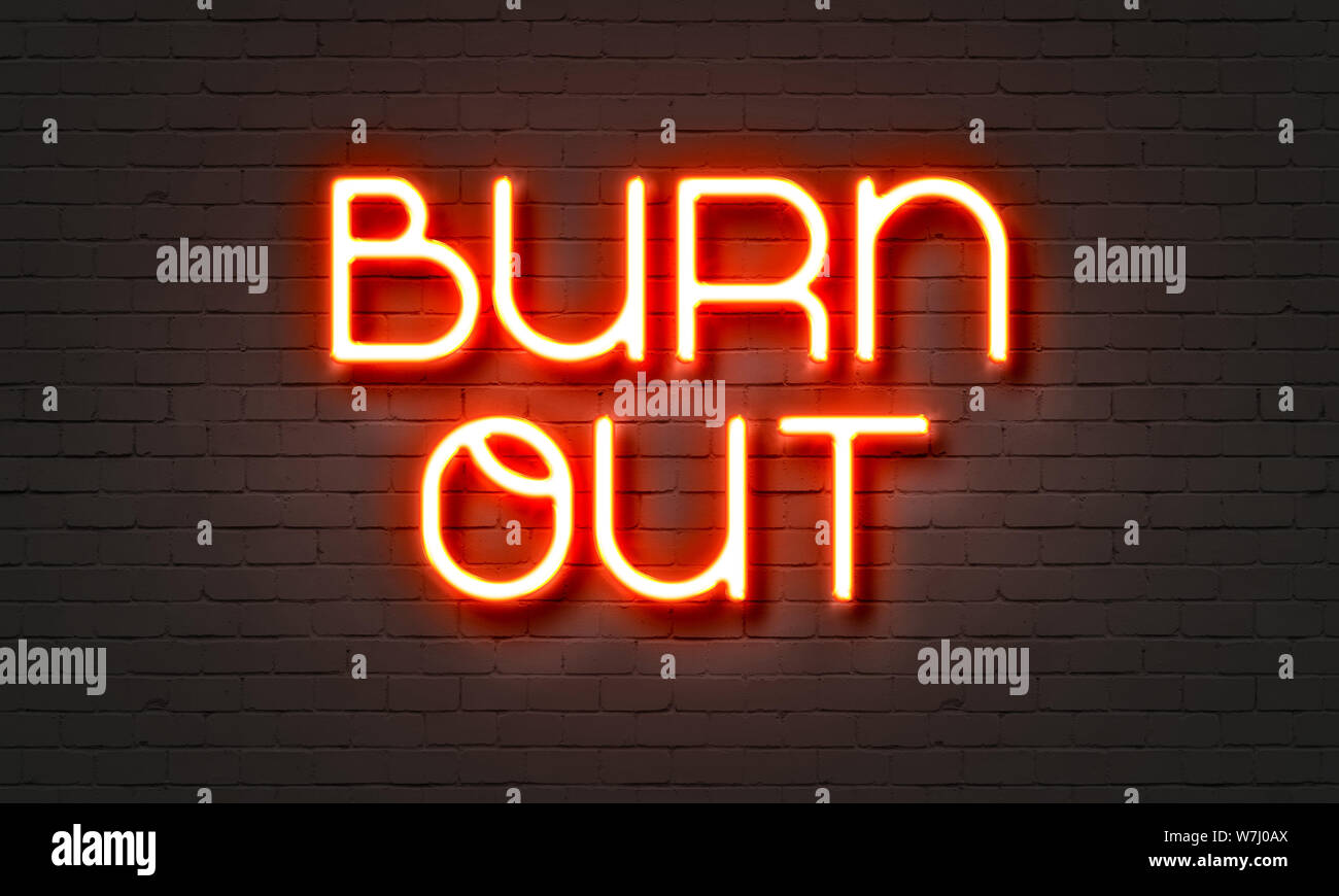 Burnout neon sign on brick wall background Stock Photo - Alamy
