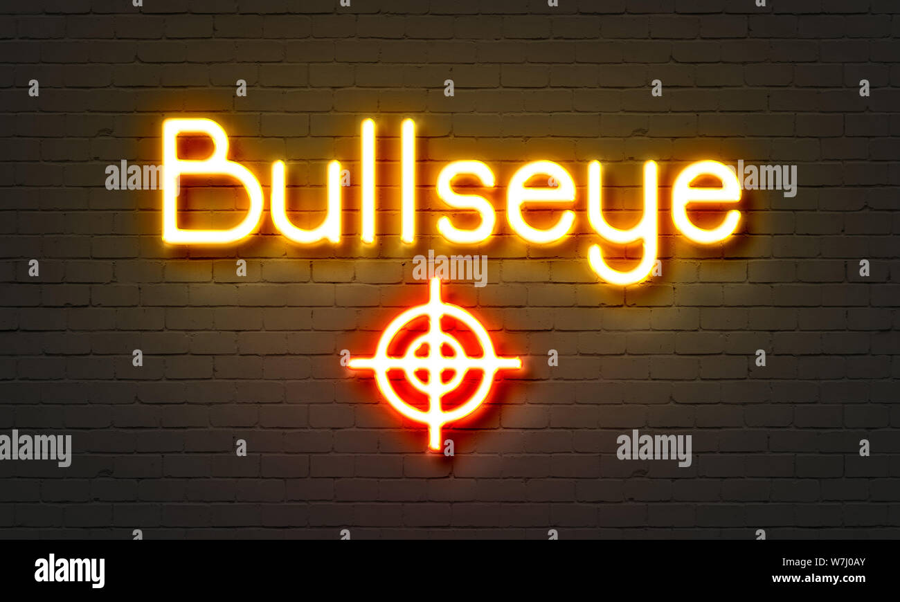 Bullseye neon sign on brick wall background Stock Photo - Alamy