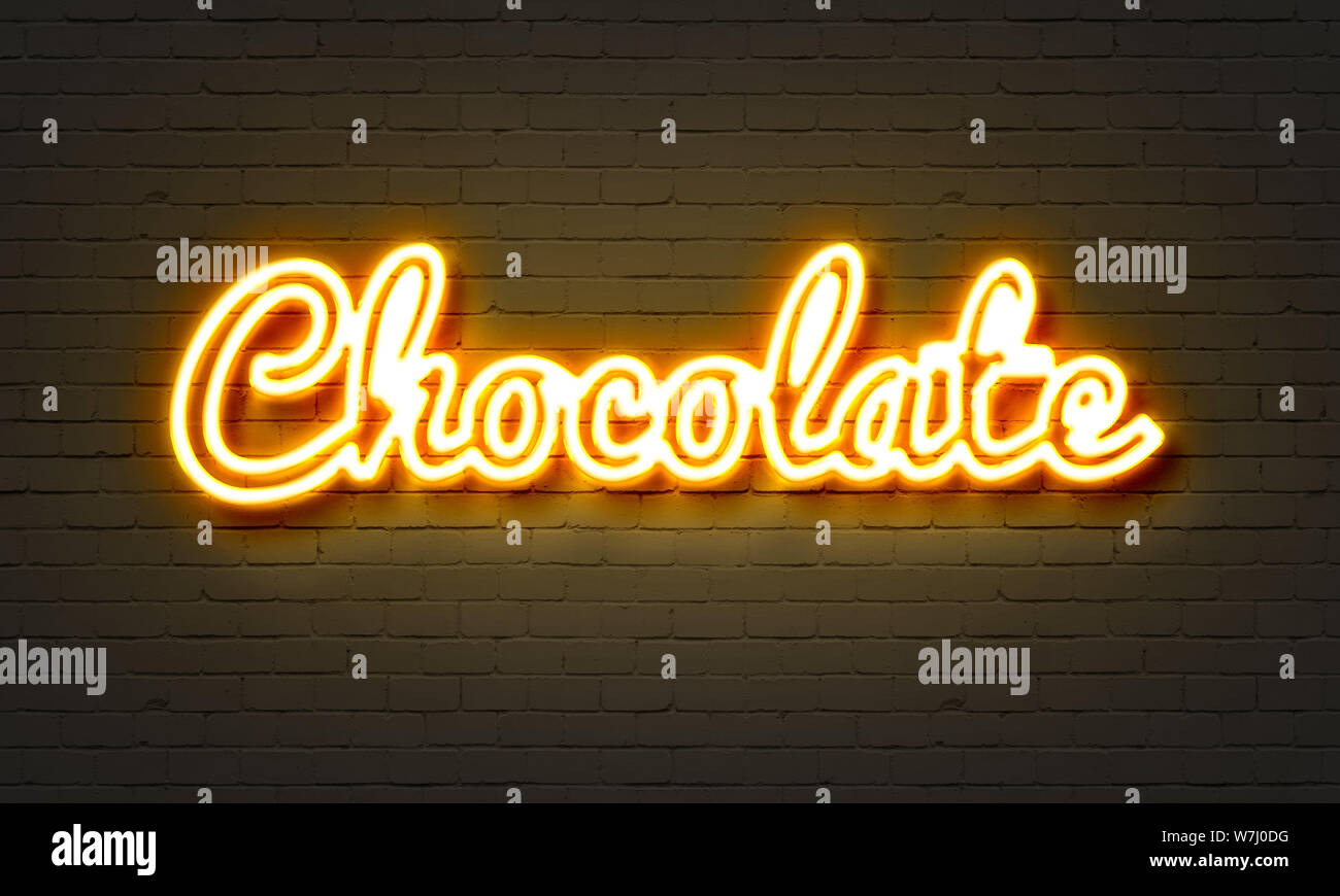 Chocolate neon sign on brick wall background Stock Photo - Alamy