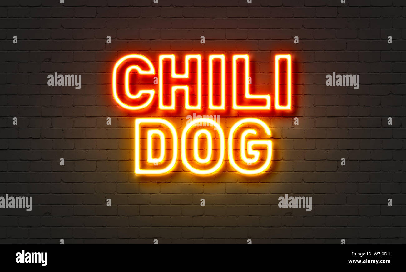 Chili dog neon sign on brick wall background Stock Photo - Alamy
