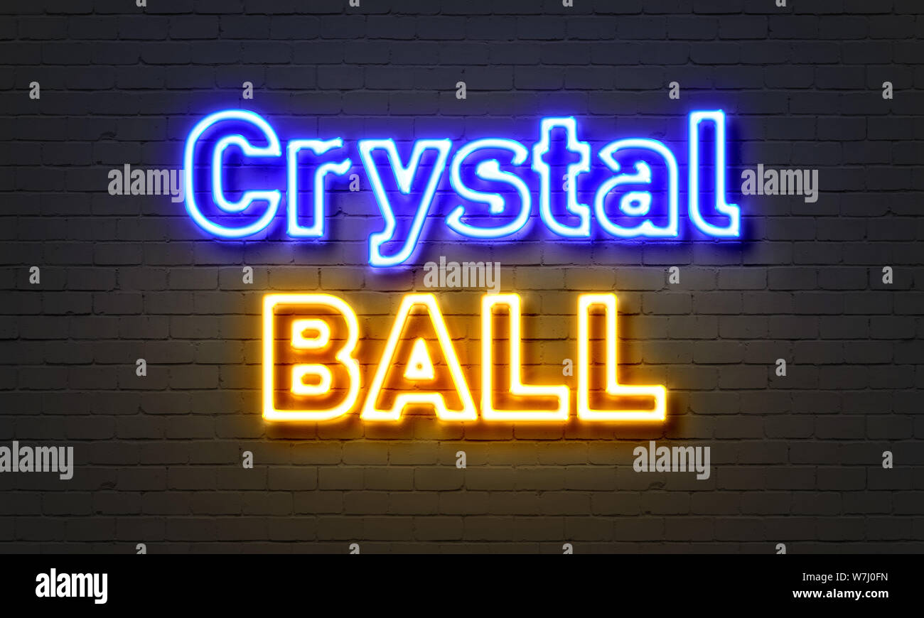 Crystal ball neon sign on brick wall background Stock Photo - Alamy