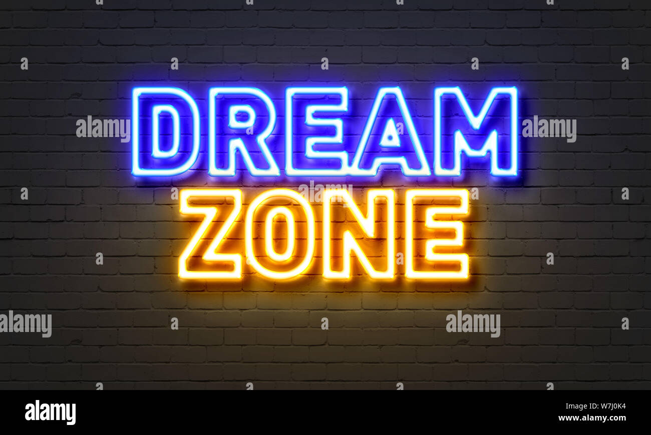 Dream zone neon sign on brick wall background Stock Photo - Alamy