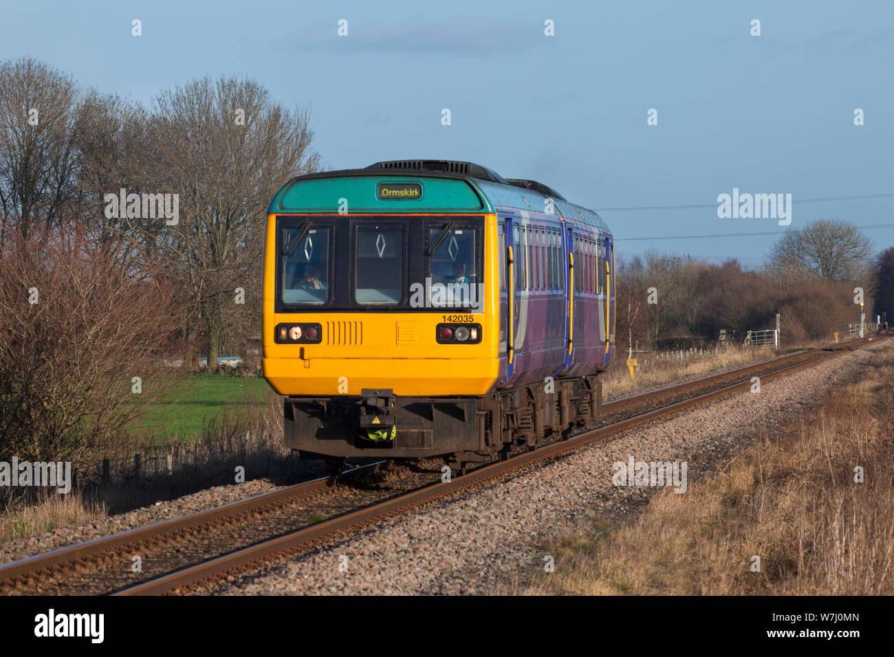 Arriva northern Raol class 142 pacer train passing Farrington Moss on ...