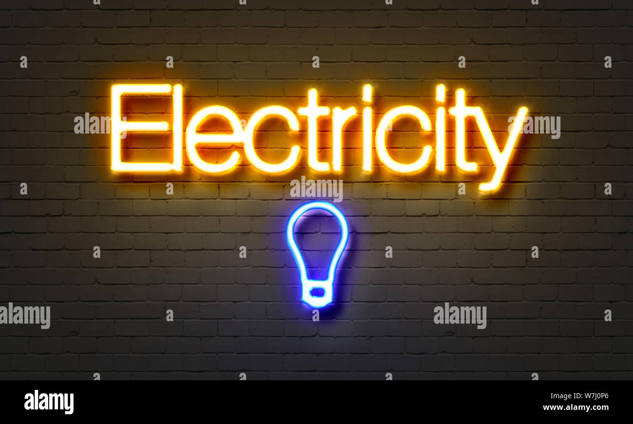 Electricity neon sign on brick wall background Stock Photo - Alamy