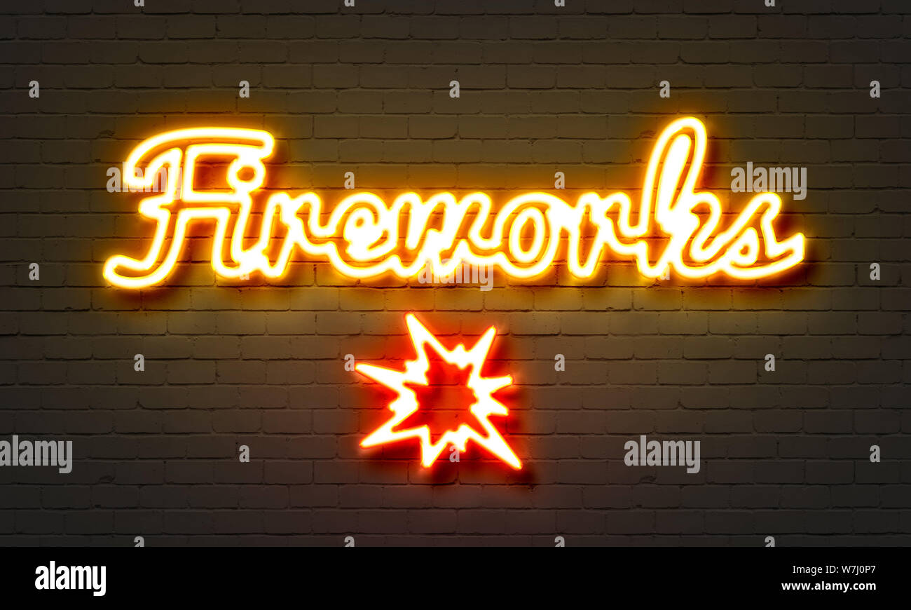 Fireworks neon sign on brick wall background Stock Photo - Alamy