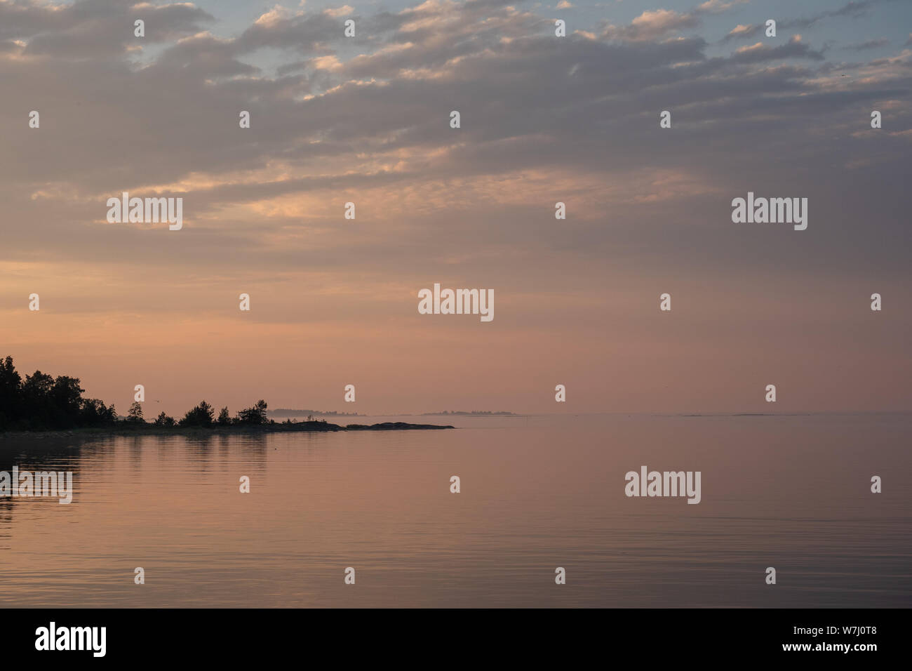 quiet mood on the sea with island Stock Photo - Alamy