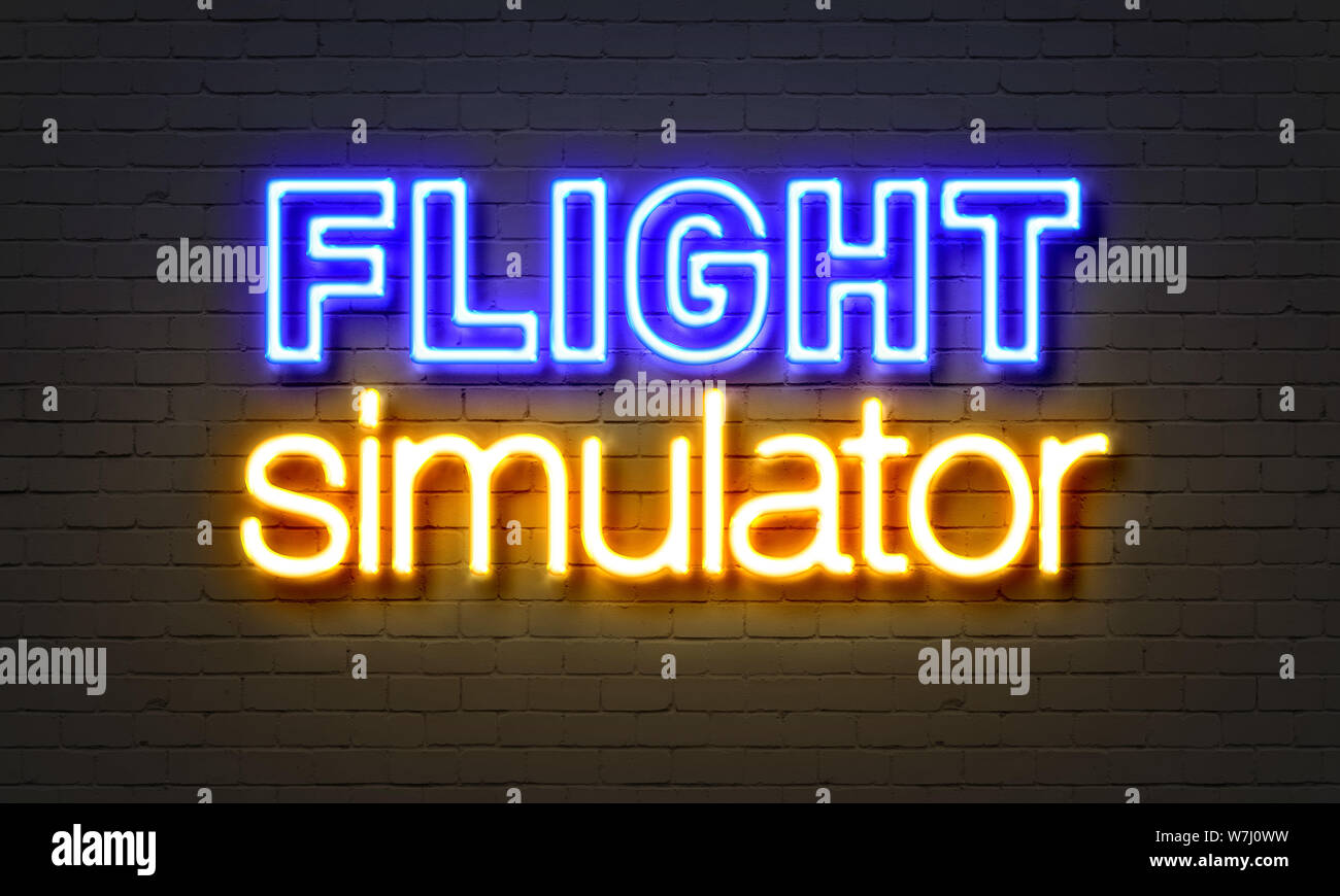 Flight simulator neon sign on brick wall background Stock Photo - Alamy