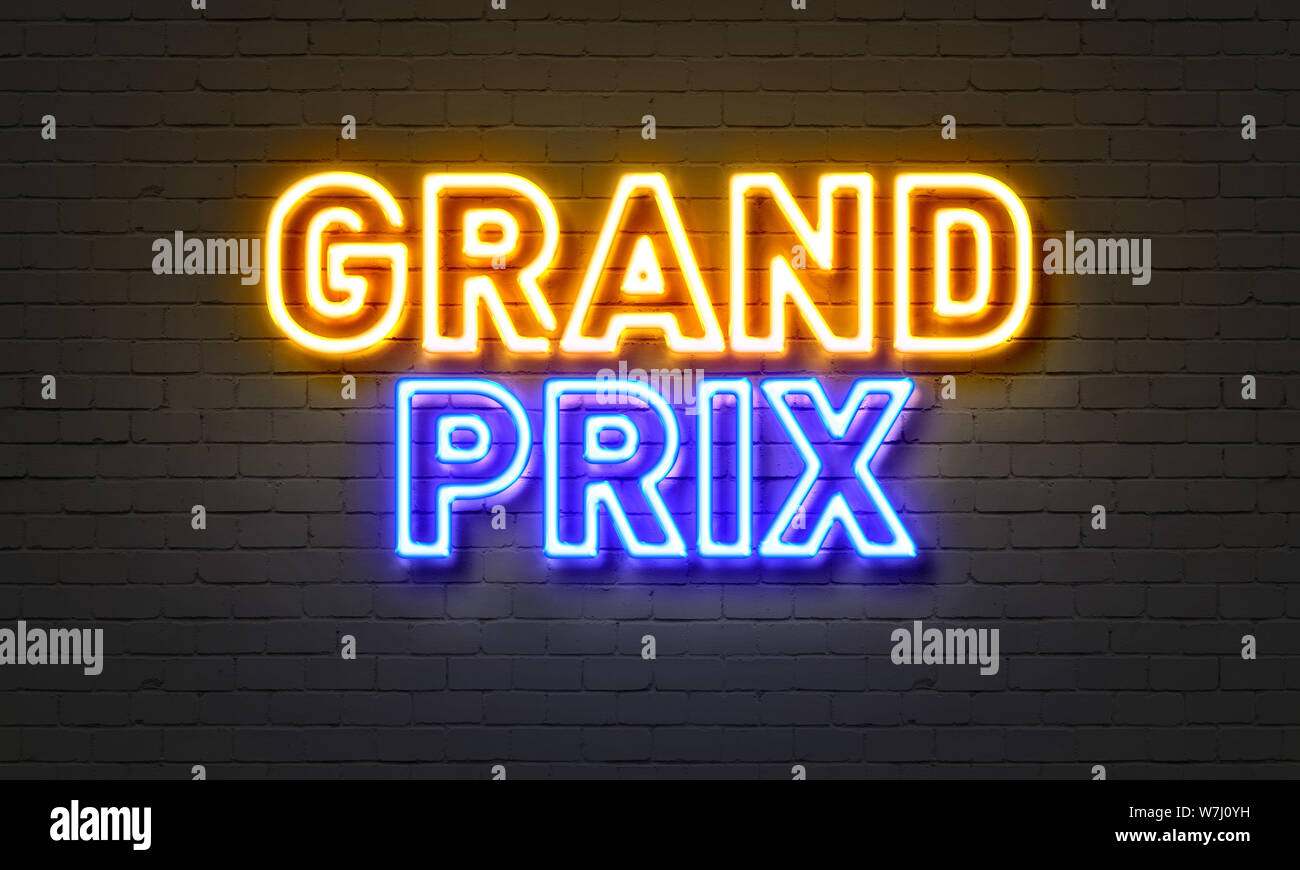 Grand prix neon sign on brick wall background Stock Photo - Alamy