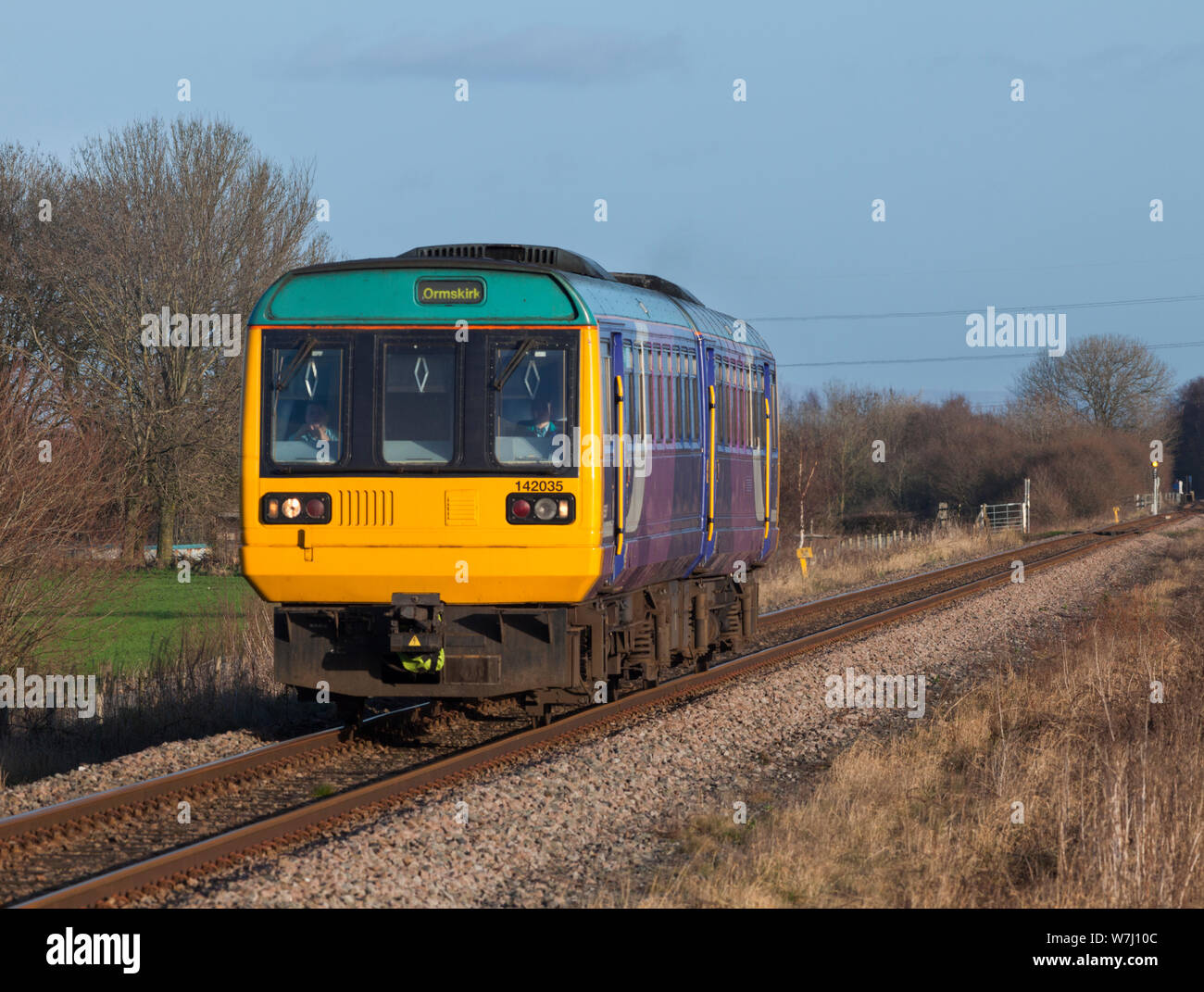 Arriva northern Raol class 142 pacer train passing Farrington Moss on the single track Ormskirk ...
