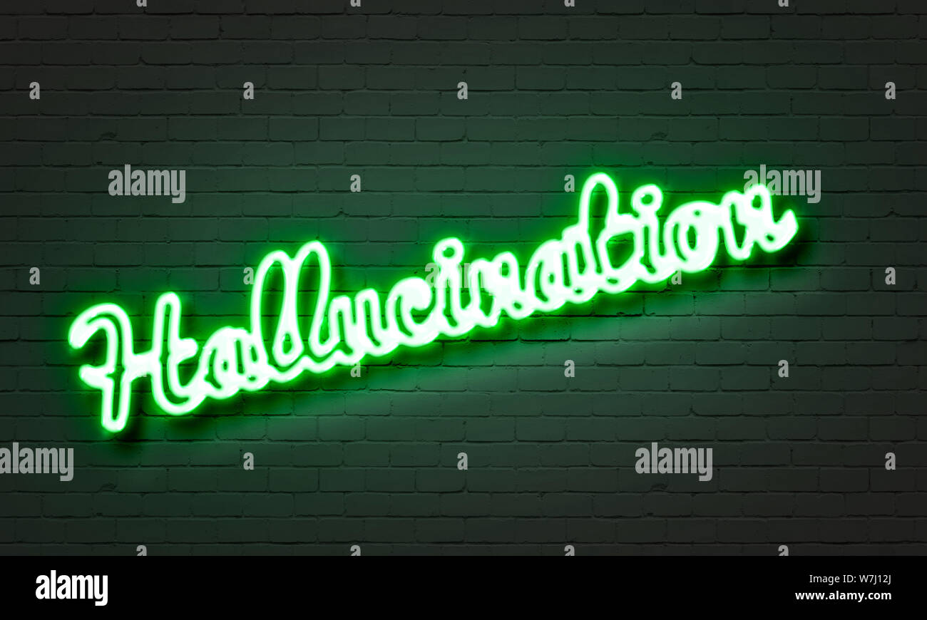 Hallucination neon sign on brick wall background Stock Photo - Alamy