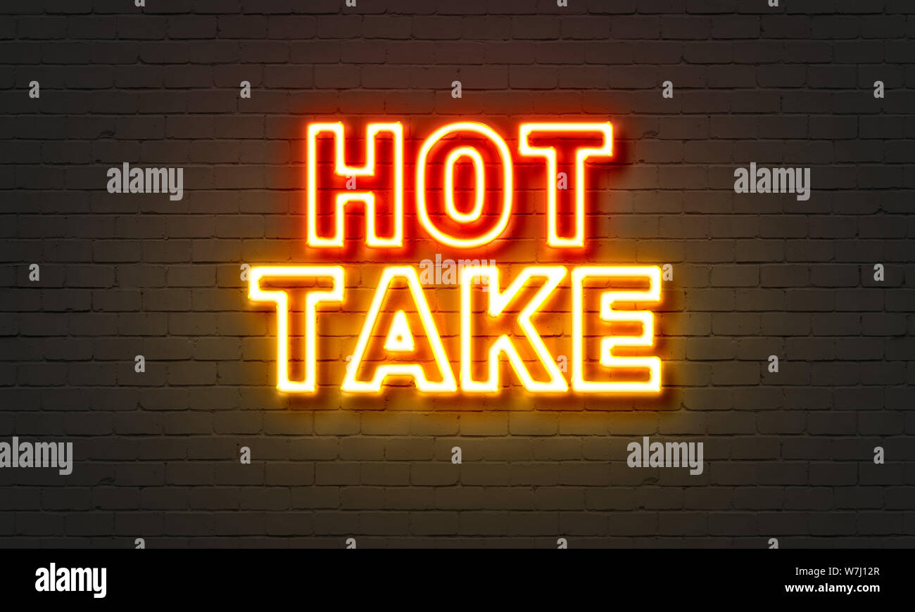 Hot take neon sign on brick wall background Stock Photo - Alamy