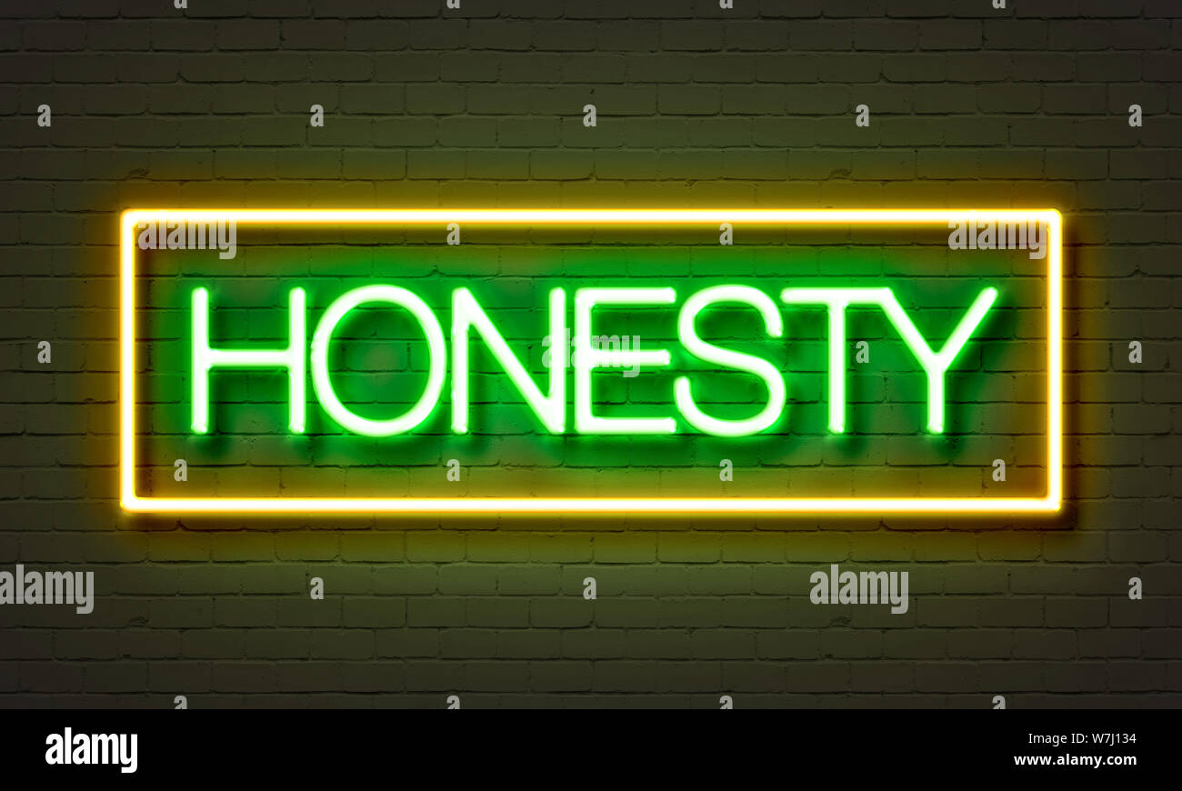 Honesty neon sign on brick wall background Stock Photo - Alamy