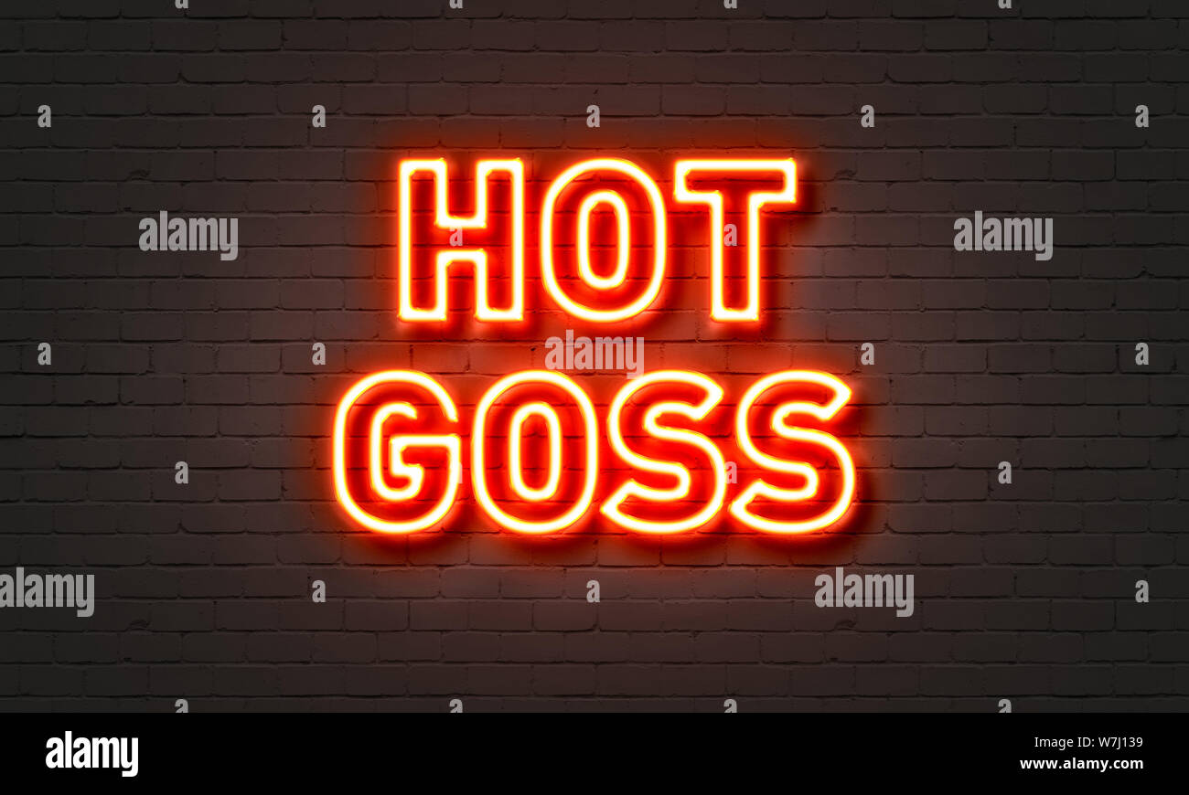 Hot goss neon sign on brick wall background Stock Photo - Alamy