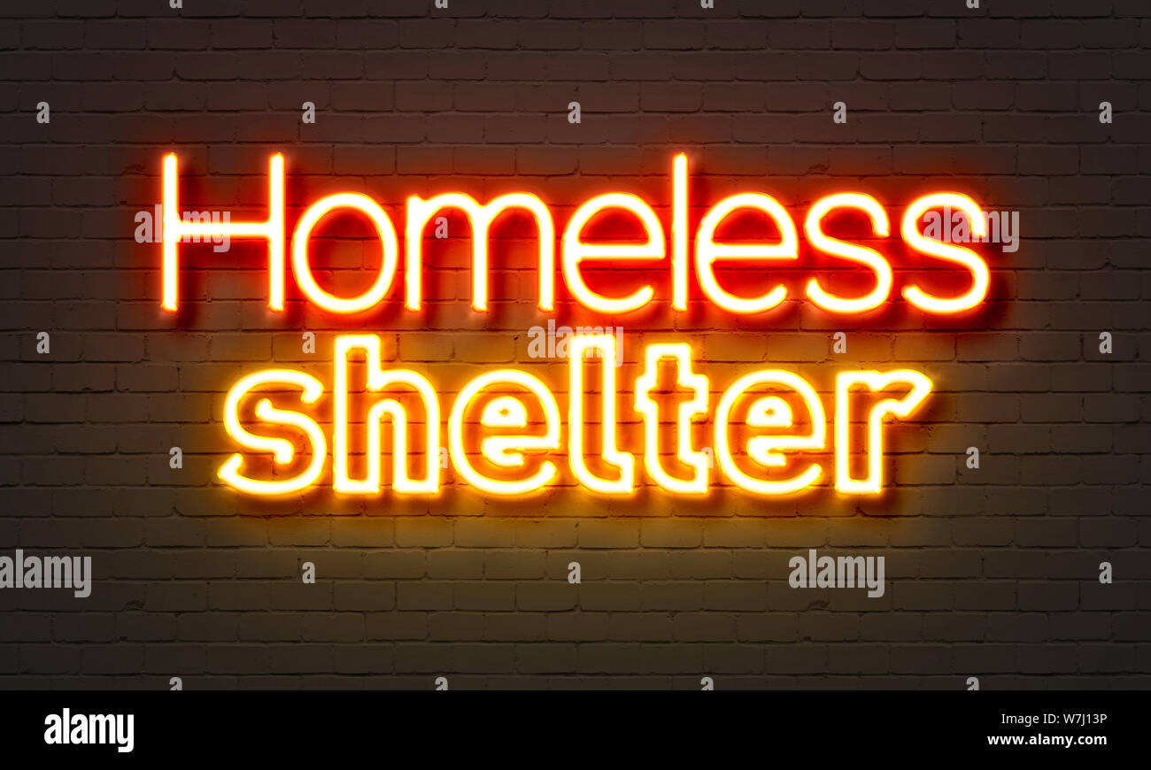 Homeless shelter neon sign on brick wall background Stock Photo - Alamy