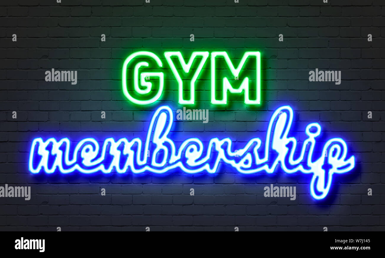 Gym membership neon sign on brick wall background Stock Photo - Alamy