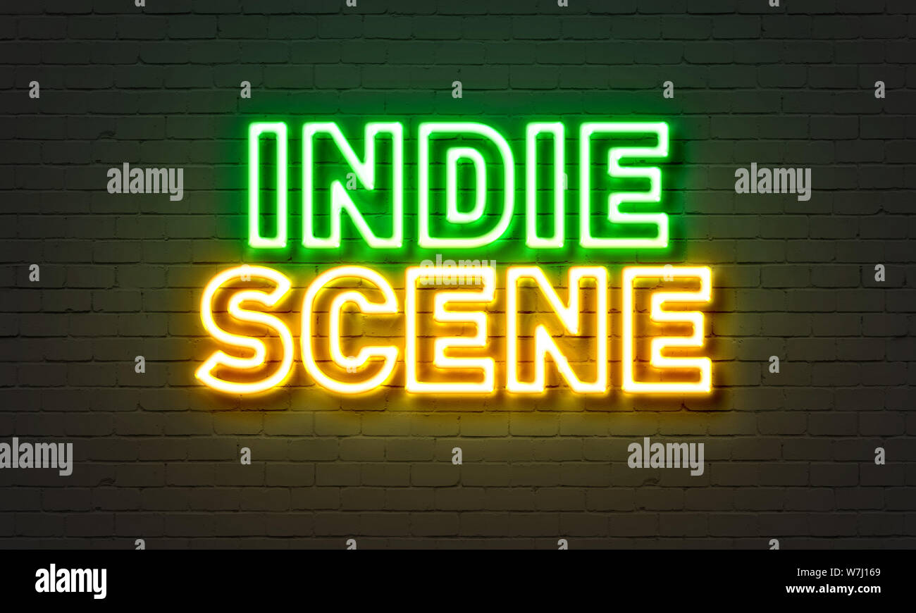 Indie scene neon sign on brick wall background Stock Photo - Alamy
