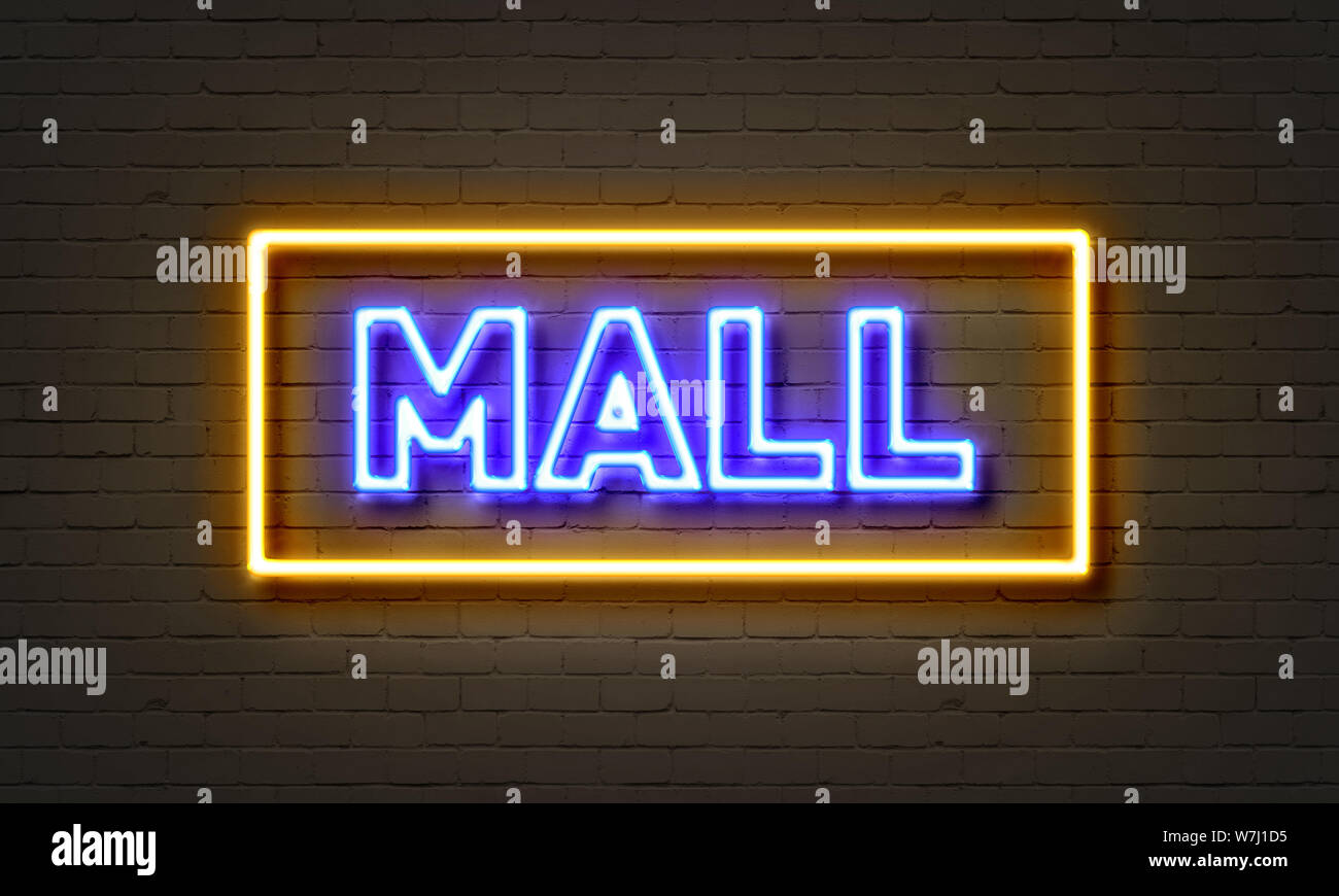 Mall neon sign on brick wall background Stock Photo - Alamy