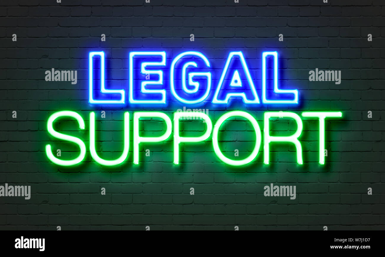 Legal support neon sign on brick wall background Stock Photo - Alamy