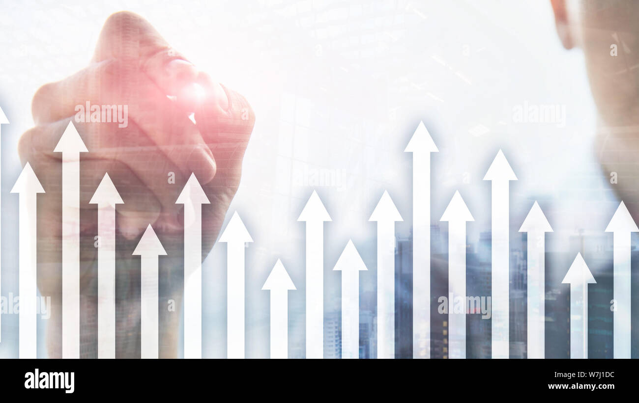 Up arrow graph on skyscraper background. Invesment and financial growth ...