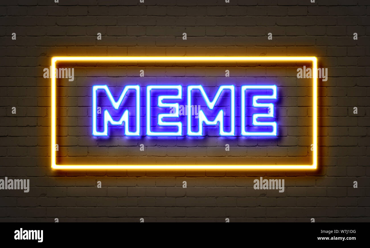 Meme neon sign on brick wall background Stock Photo - Alamy