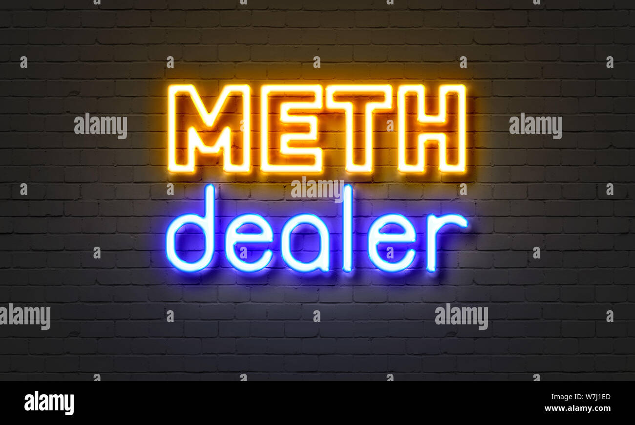 Meth dealer neon sign on brick wall background Stock Photo - Alamy
