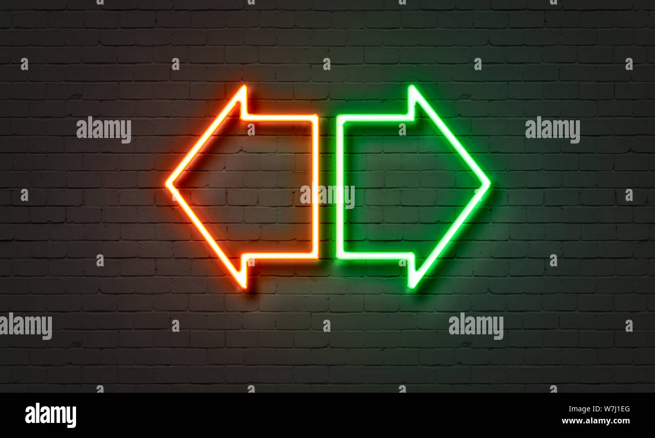 Left right neon sign on brick wall background Stock Photo - Alamy