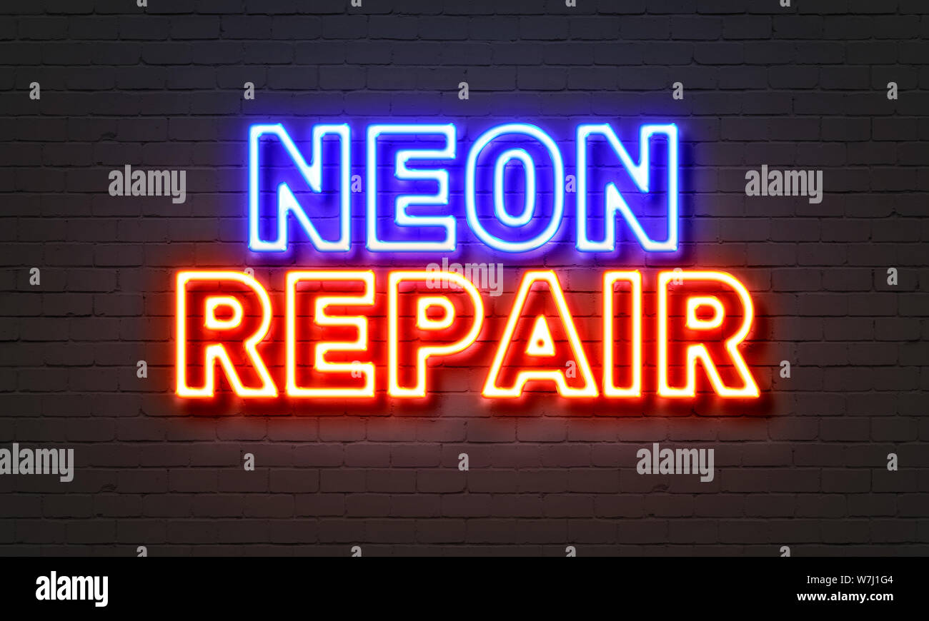 Neon repair neon sign on brick wall background Stock Photo - Alamy